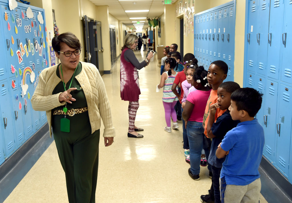 Principal Tikki Hines Brought Hope and Aura of Success to Barrett ...